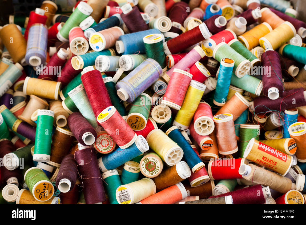 Amsterdam Noordermarkt sale box with a variety of spools, bobbins with ...