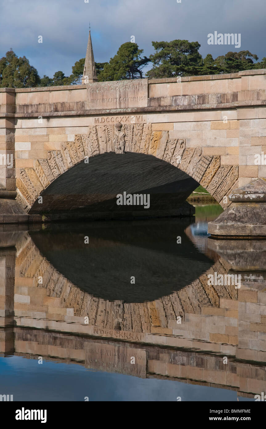 The historic old sandstone Ross Bridge on the outskirts of the village ...