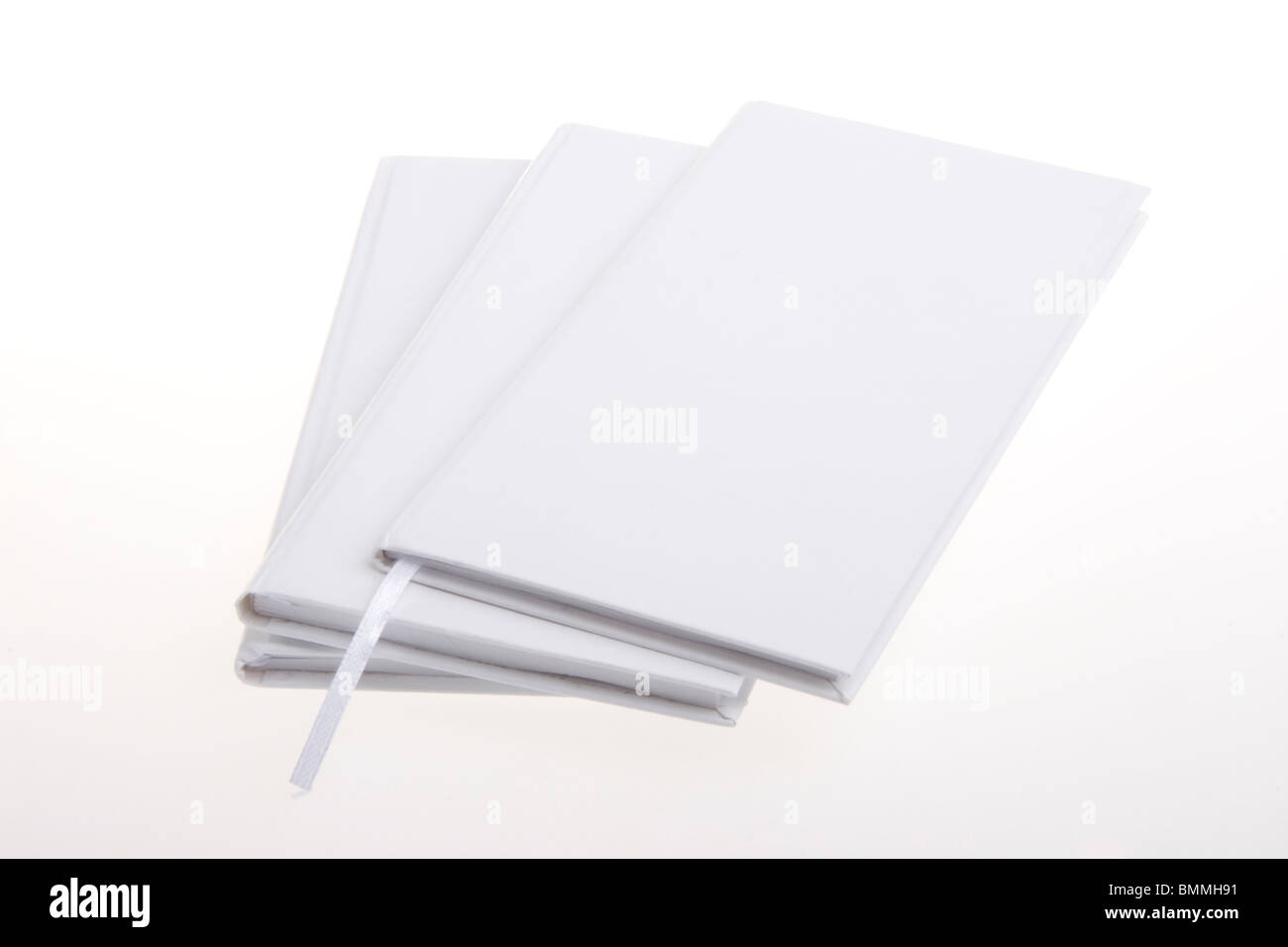 Stack of white diaries Stock Photo - Alamy