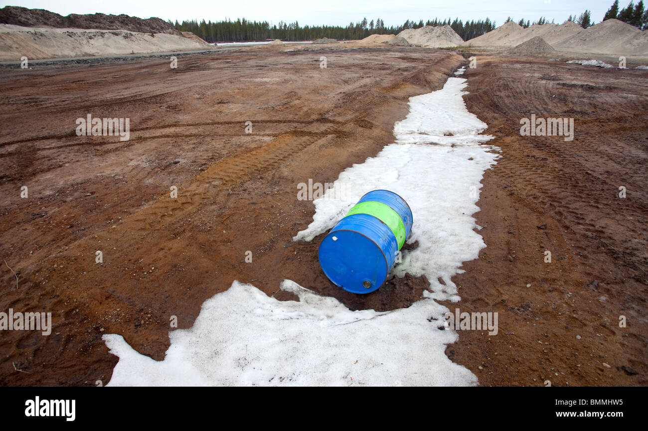 Discarded lubricant oil barrel on a gravel pit sand quarrying , Finland ...
