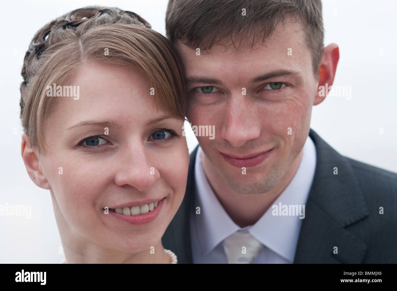 Young happy loving couple. Two faces close up Stock Photo - Alamy