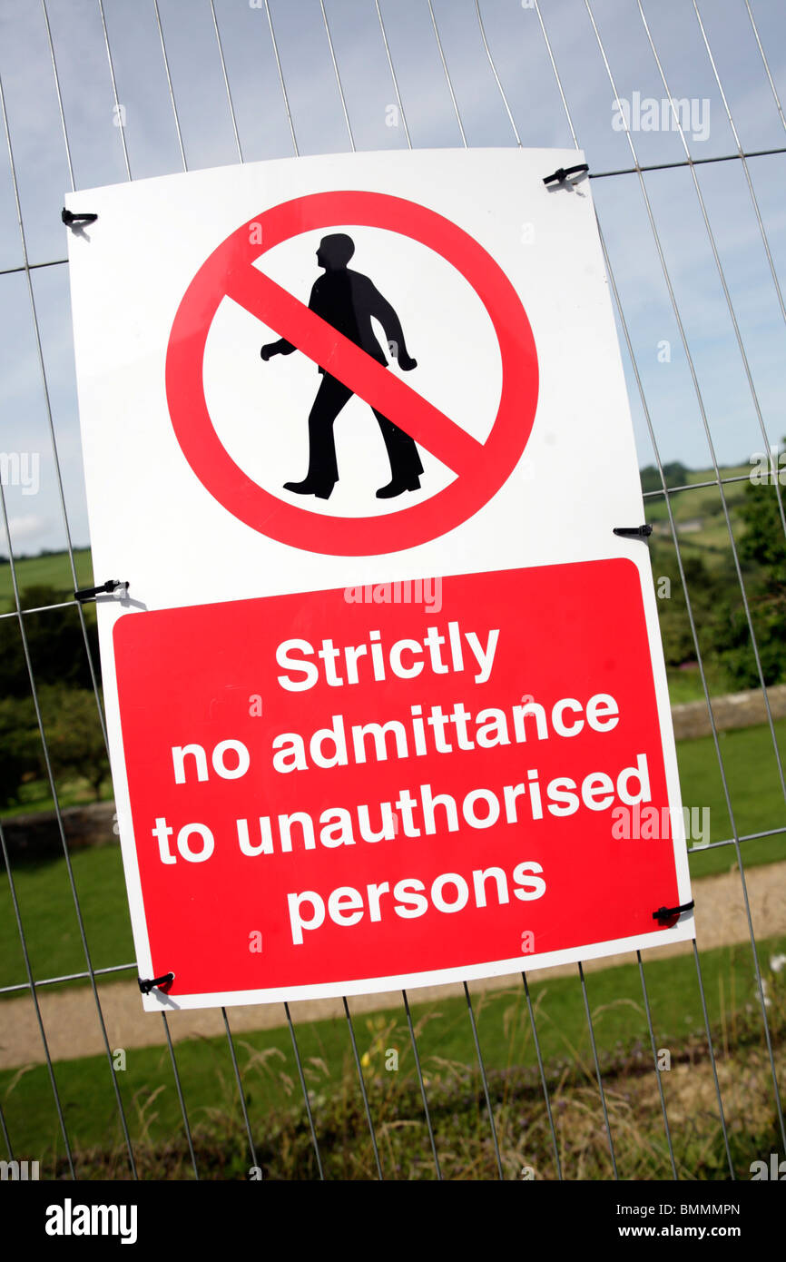 Strictly no Admittance to Unauthorised Persons Sign on fence ...