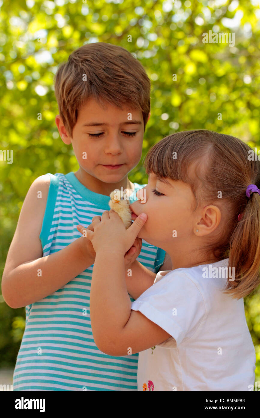 Kids and chick Stock Photo - Alamy