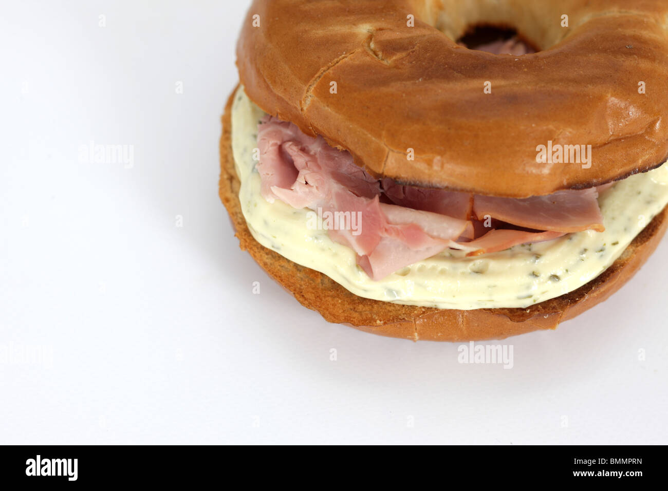 Toasted Primula Cheese with Ham Bagel Stock Photo - Alamy