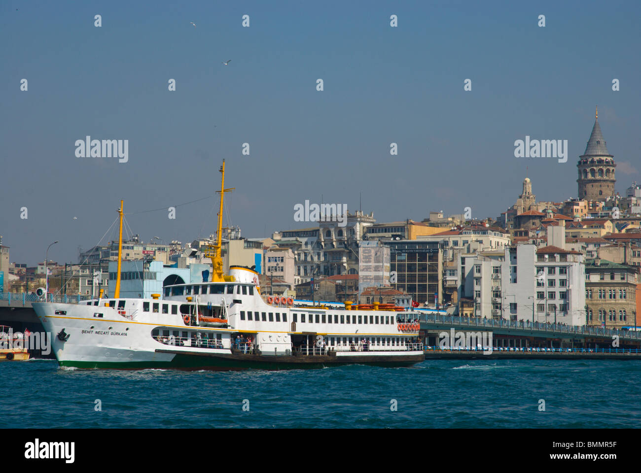 Ferry in front of Galata bridge between Beyoglu and Sultanahmet ...