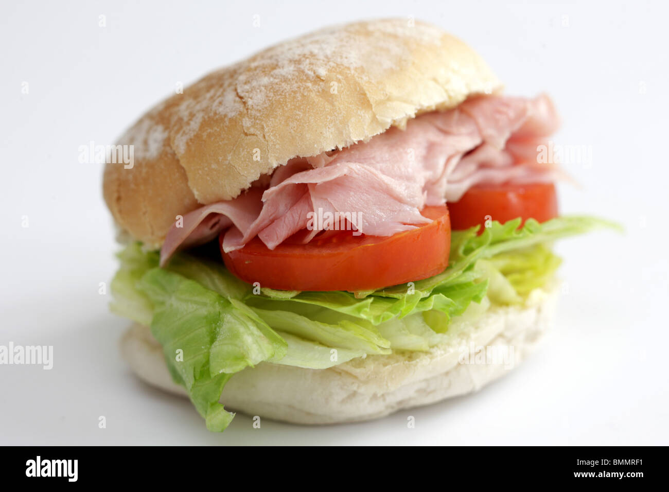 Freshly Ham Roll With Lettuce And Tomato Salad Filling Against A White ...