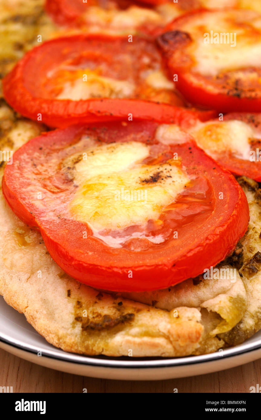 Pita bread with tomato and cow Mozzarella cheese toppings Stock Photo ...