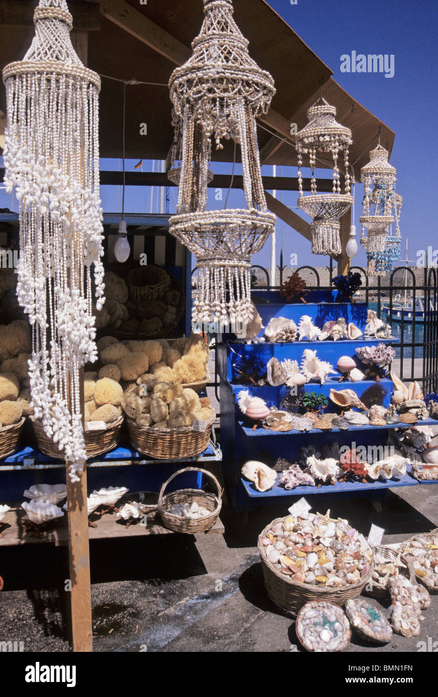 sales booth with sponges and shells, Rhodes, Greece Stock Photo - Alamy