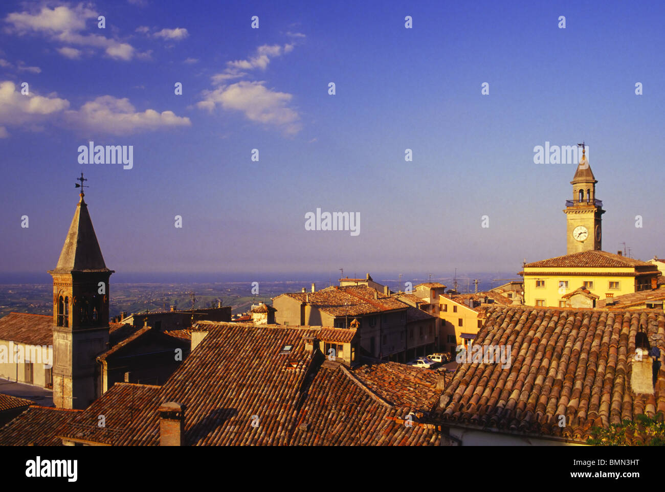 Italy, San Marino, Borgo Maggiore Rooftops And Church Stock Photo - Alamy
