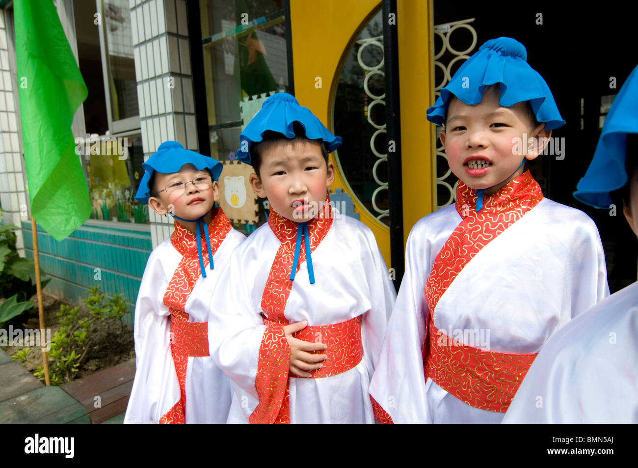 Chinese children during a cultural show at their elementary school in ...