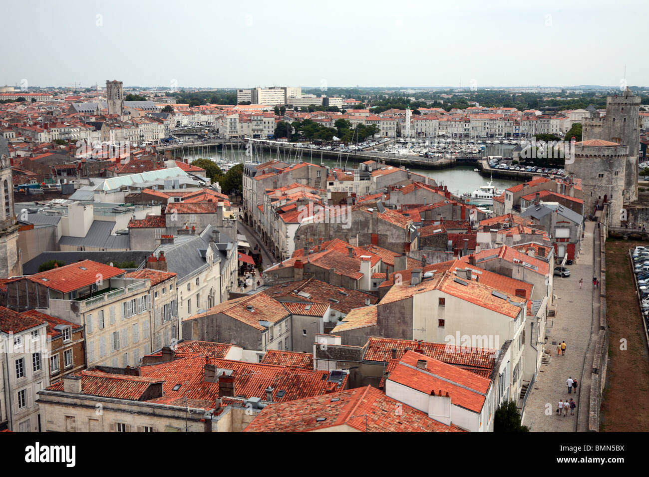 A view over the city of La Rochelle showing the Harbour And the towers ...