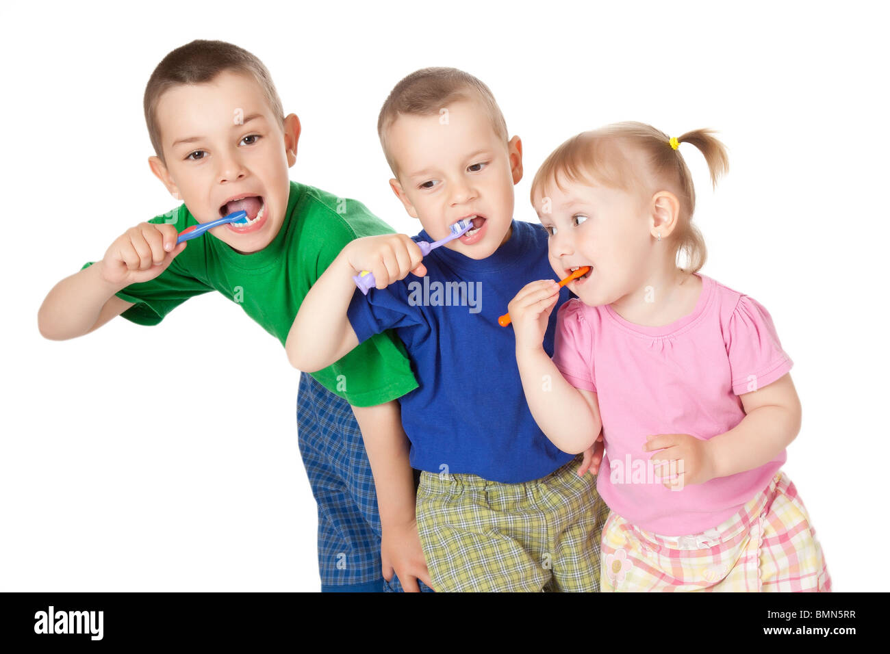 studio shot of children to brush his teeth Stock Photo - Alamy
