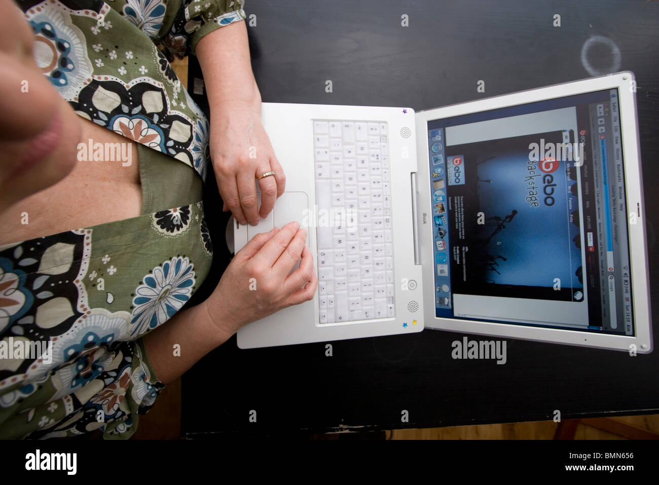 Female browsing the Bebo social networking website on a laptop, with a ...