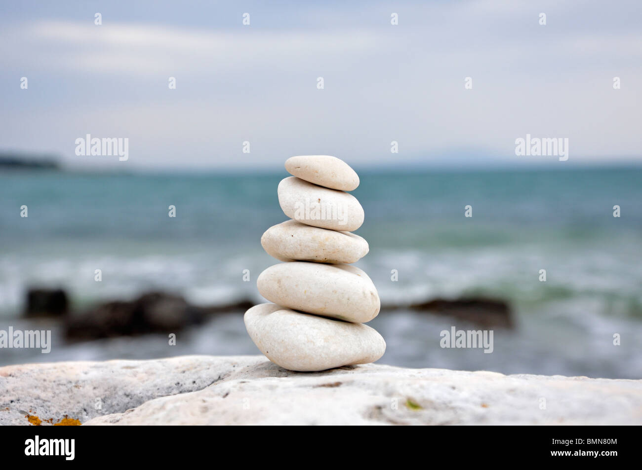 Balanced pebble stones blue hi-res stock photography and images - Alamy