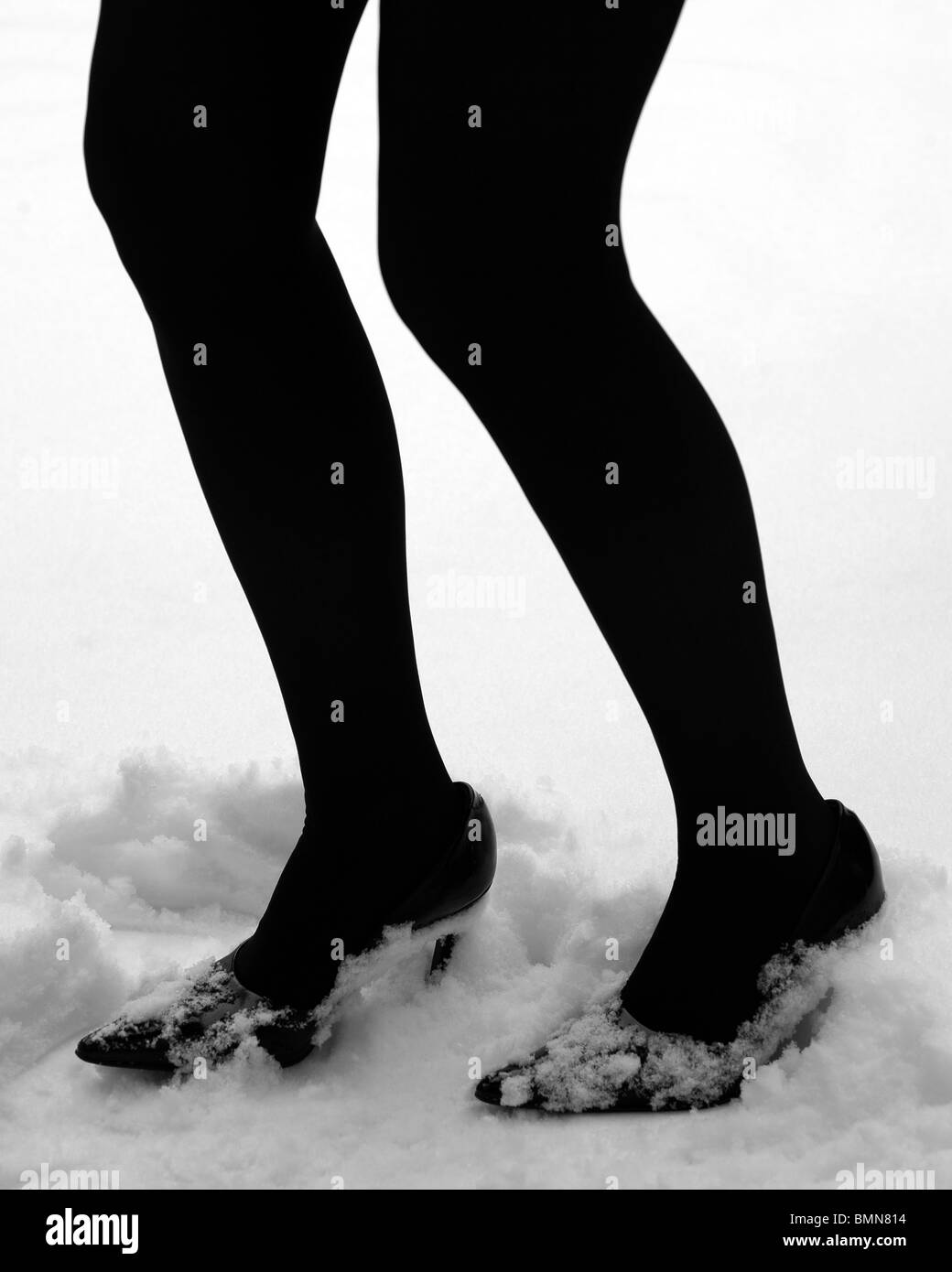 woman's legs in snow Stock Photo - Alamy