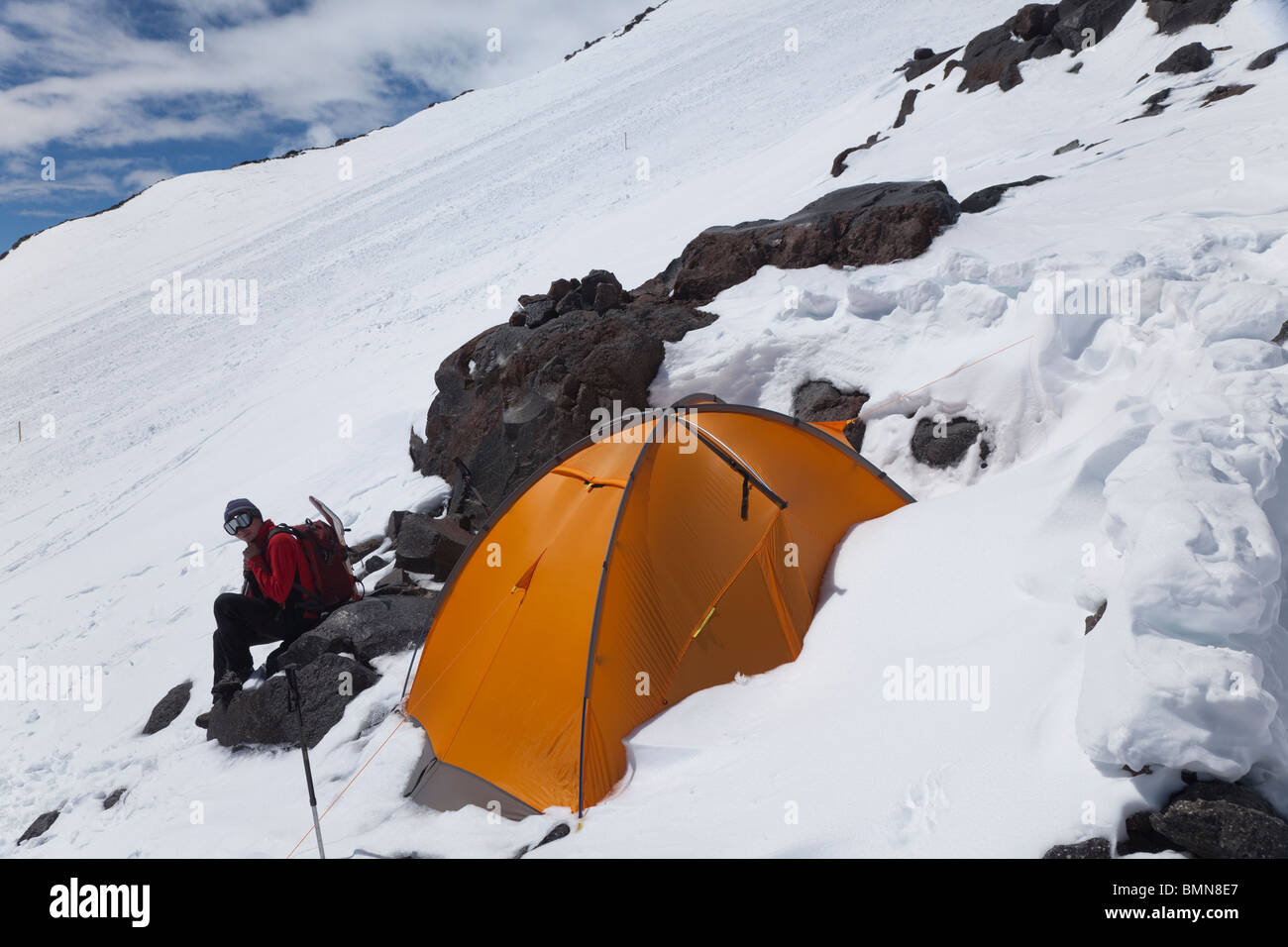 Mountain climber in advanced base camp (ABC) on mountainside, Mt ...