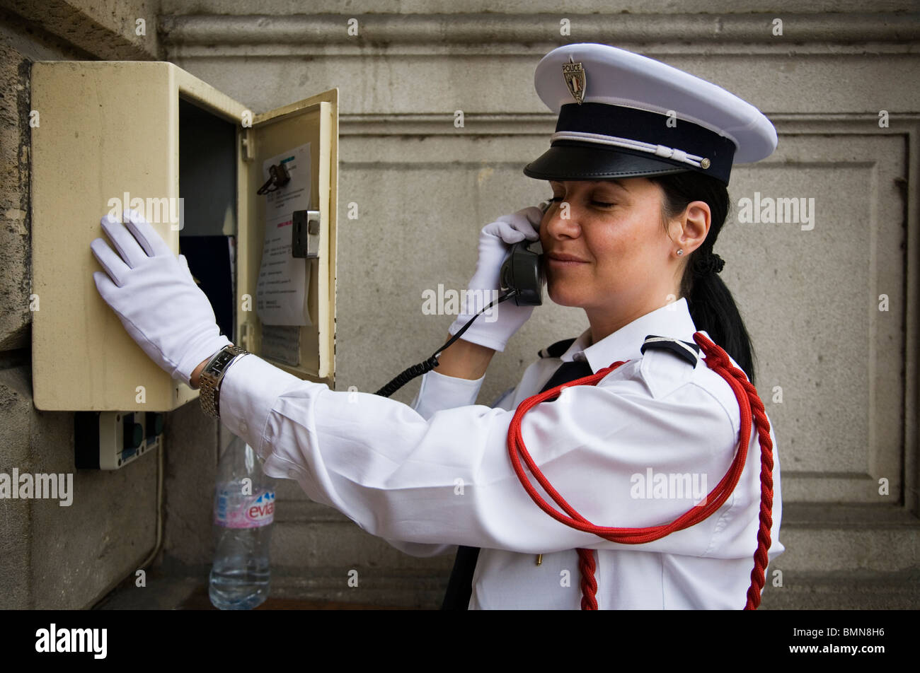 A Chic and pretty police officer guarding the Police Department, Paris ...