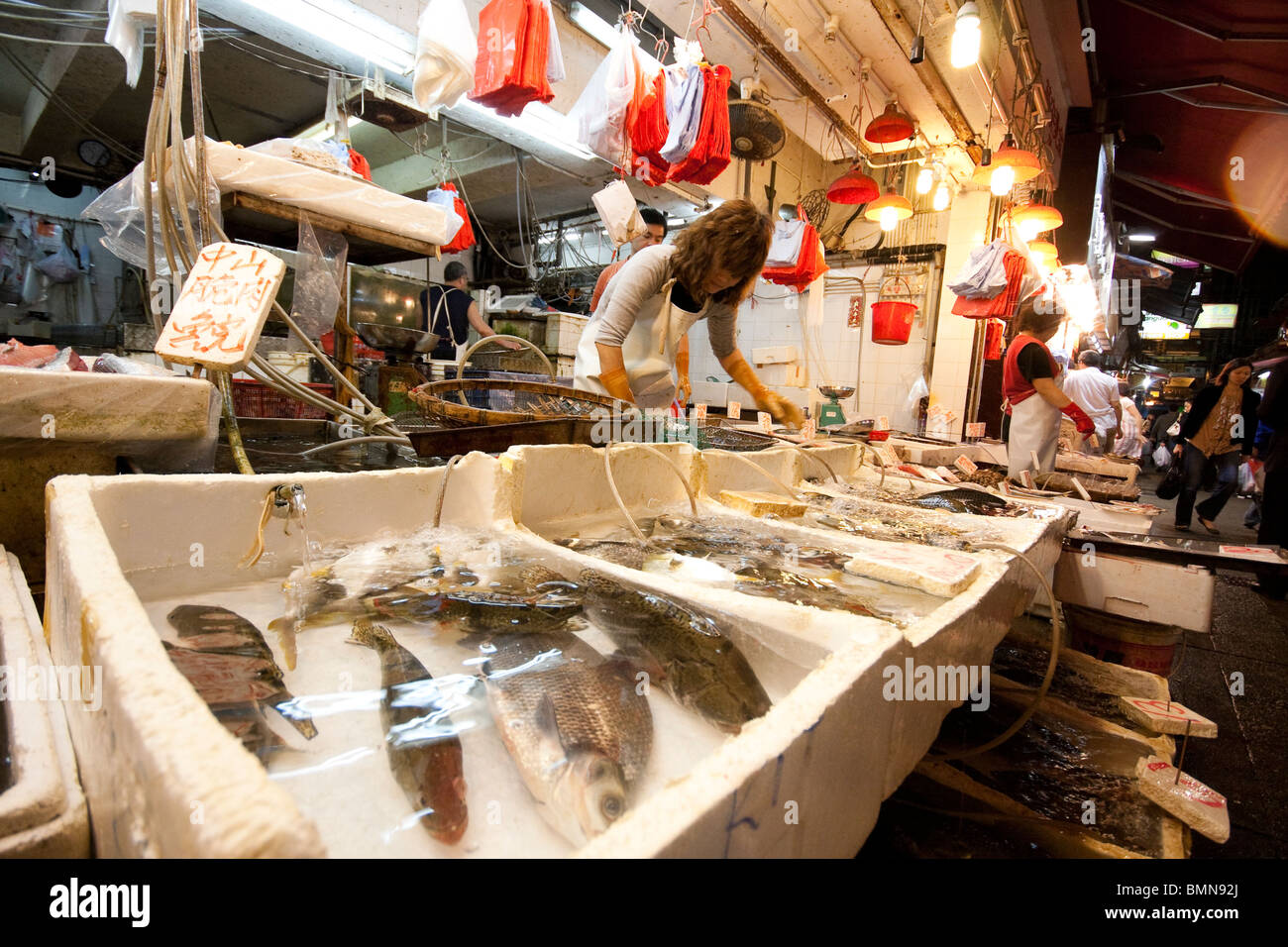 Fishes and Seafood on display in shop in fish market in Hong Kong Stock ...