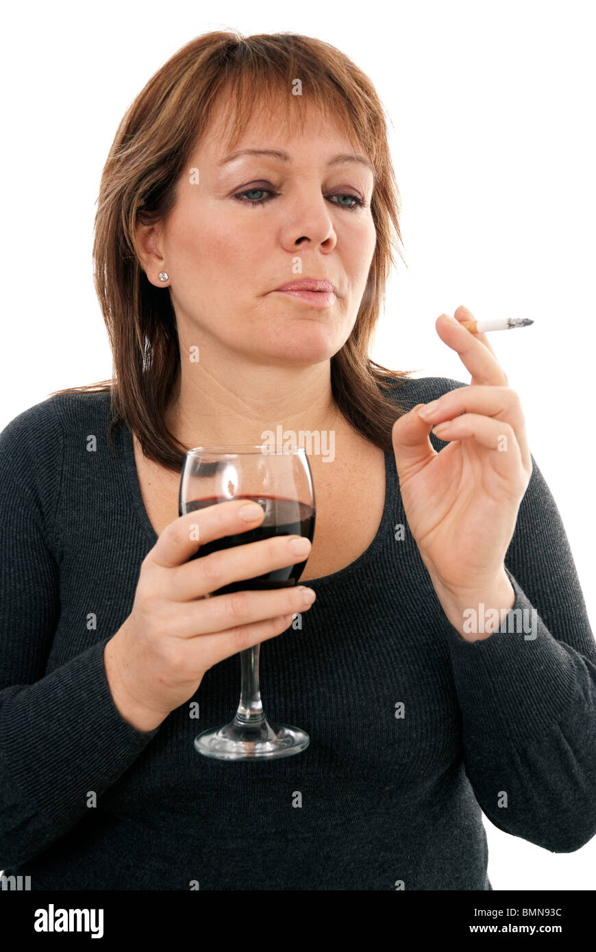 Mature Woman Smoking Cigarette Stock Photos & Mature Woman Smoking ...