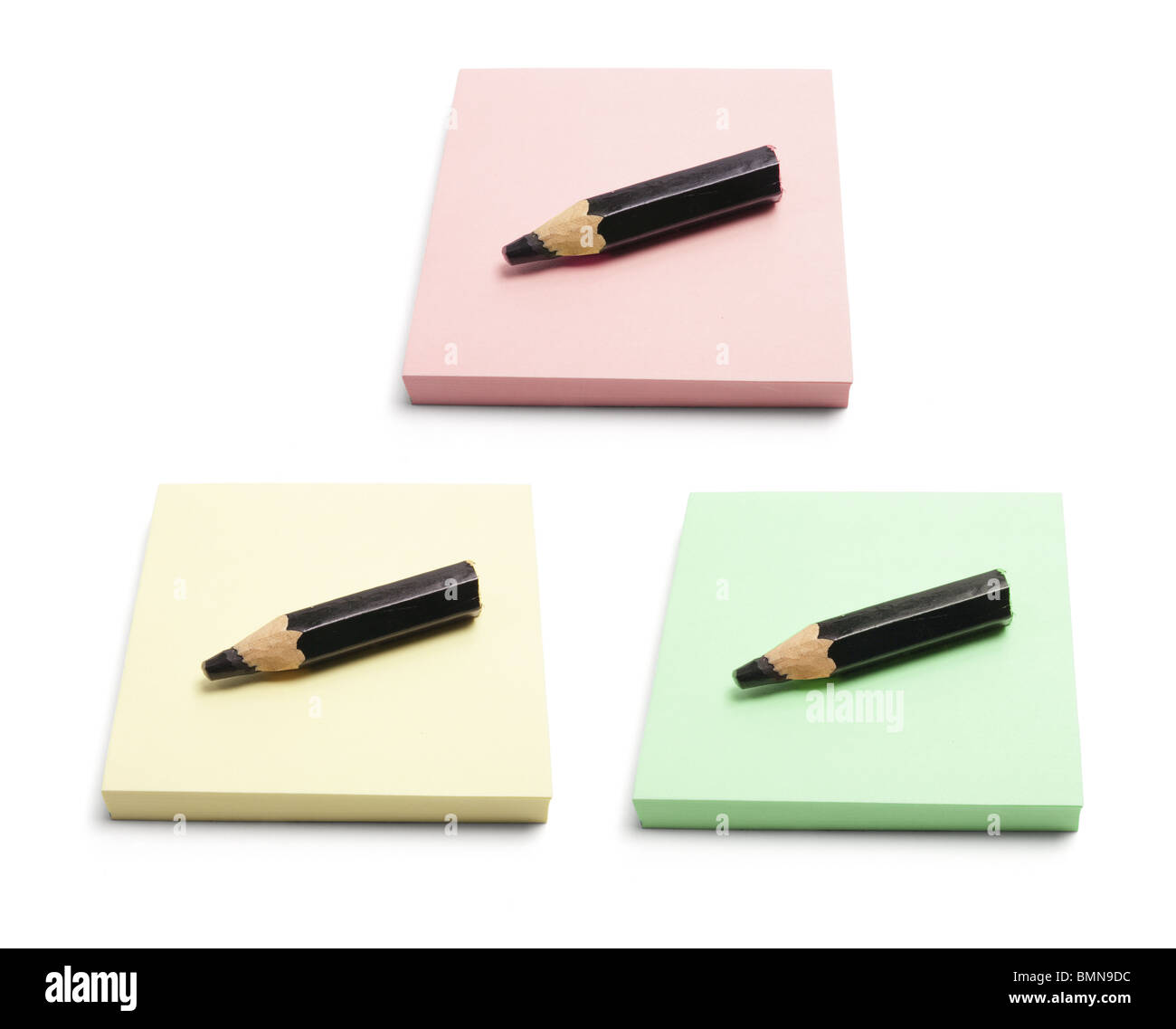 Black Pencils on Post It Note Pads Stock Photo - Alamy