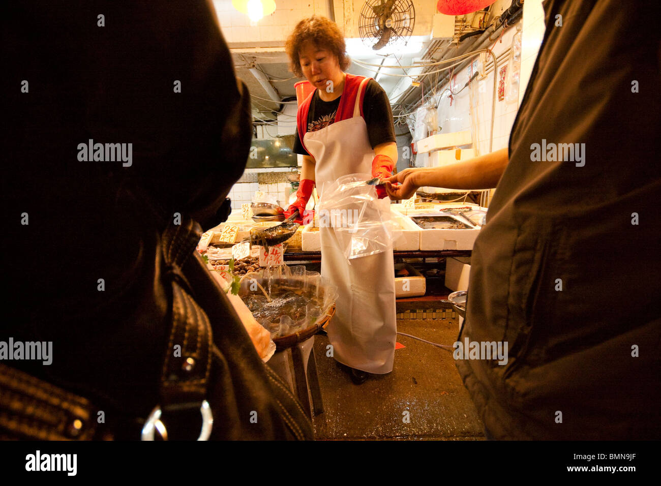 Female butcher indoor meat market hi-res stock photography and images ...
