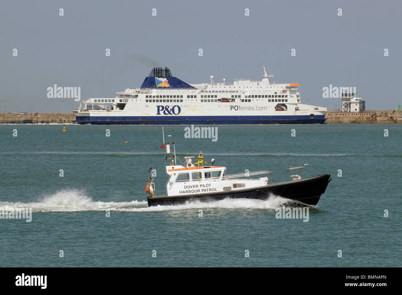 Dover Harbour pilot and patrol boat underway across Dover Harbour Kent ...