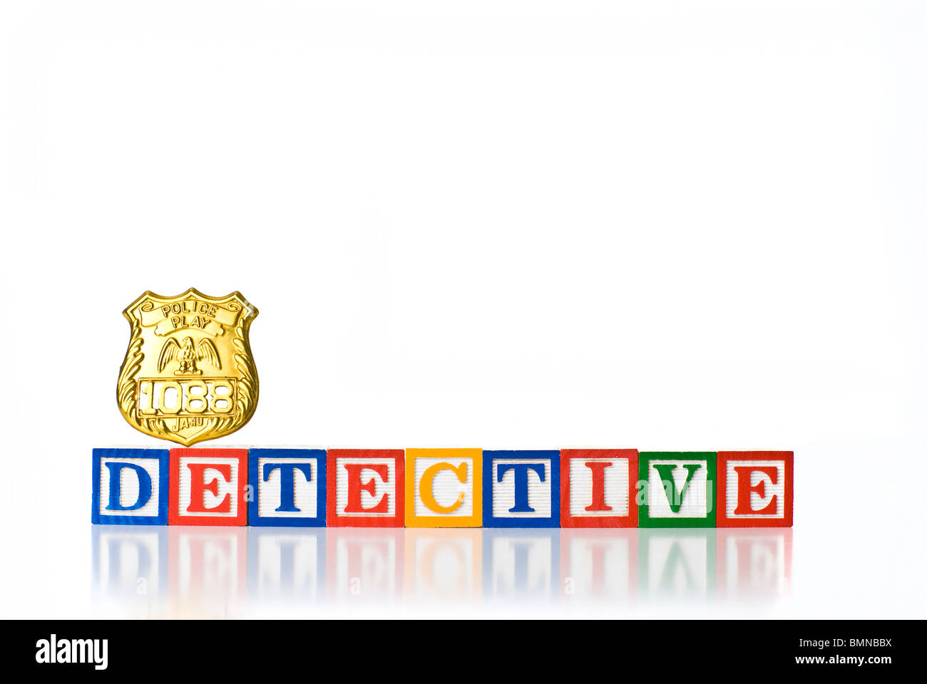Colorful children's blocks spelling DETECTIVE with a police badge Stock ...