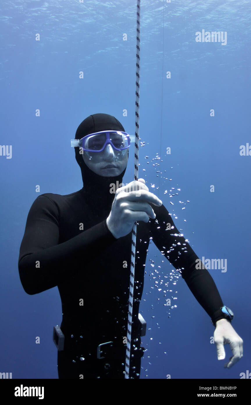 Freediver trains his deconcentration and relaxation technique while ...