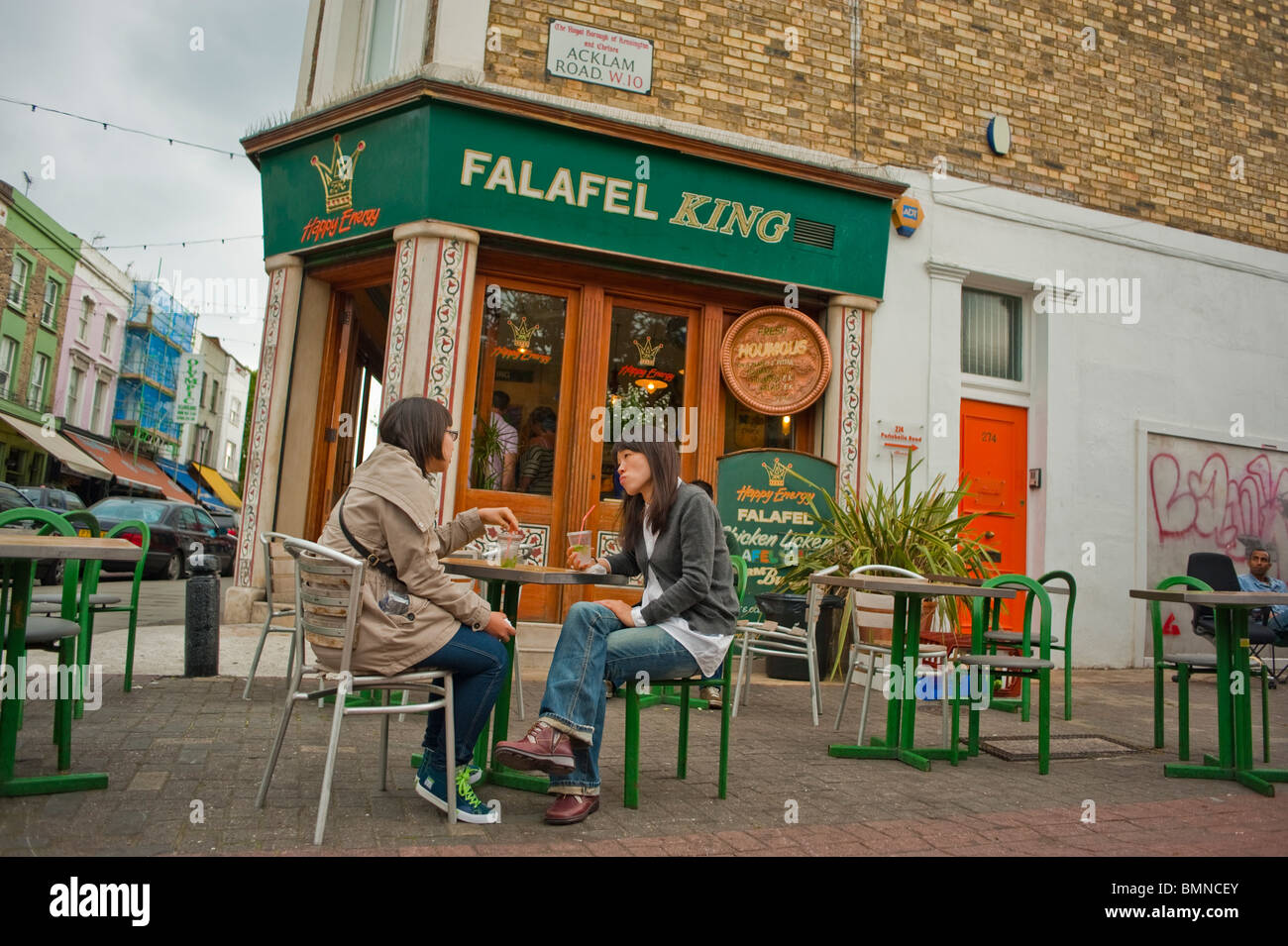London, England, UK, 2 Women Eating outside "Falafel King" Fast Food ...