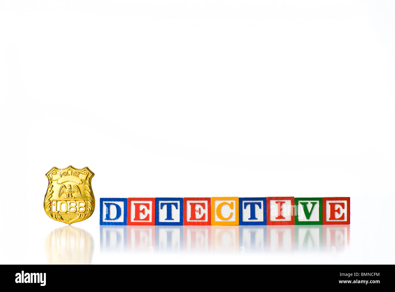 Colorful children's blocks spelling DETECTIVE with a police badge Stock ...