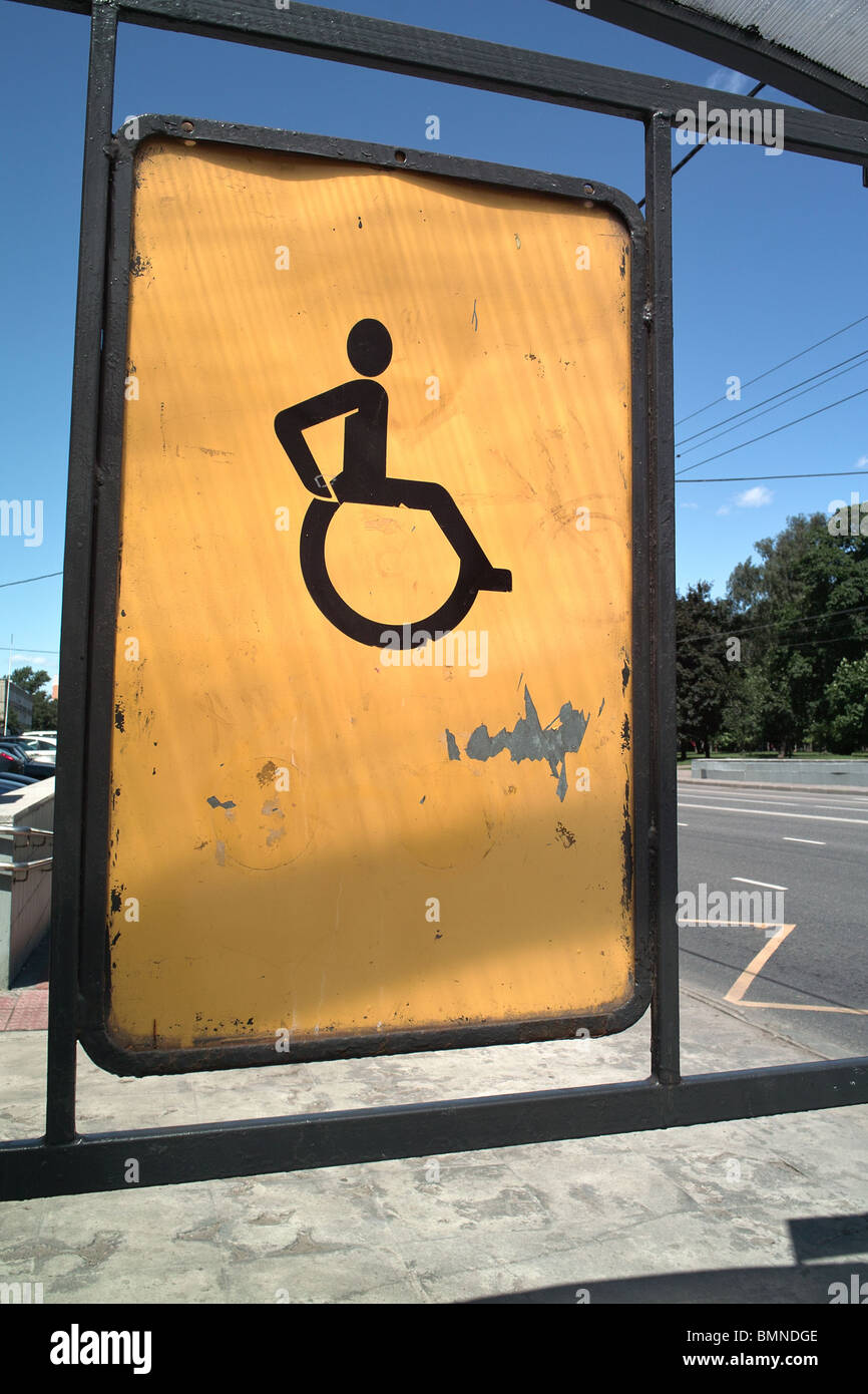 Yellow color handicapped road sign Stock Photo - Alamy