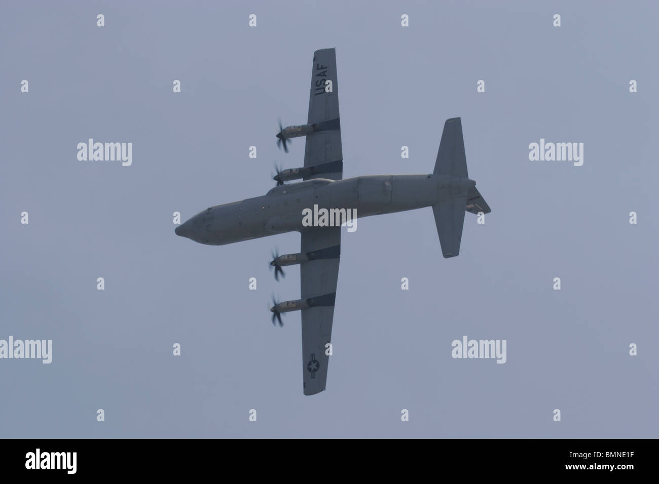 A C-130J of the Rhode Island Air National Guard makes a steep banking ...