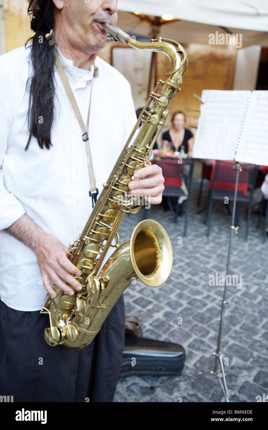 Busker buskers busking in the street streets hi-res stock photography ...