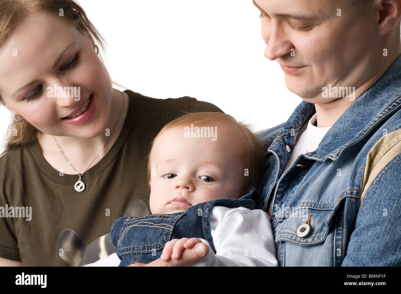 Happy smiling parents with baby, isolated on white Stock Photo - Alamy