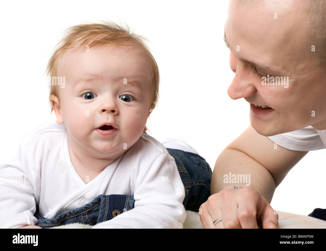 Happy daddy looks at the kid, isolated on white Stock Photo - Alamy