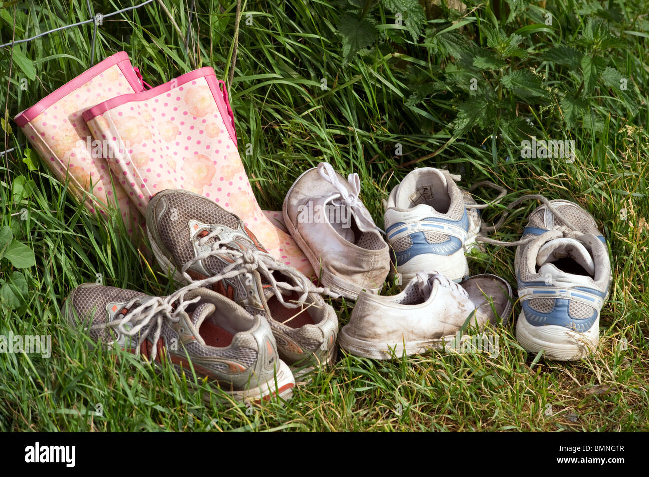 Pile trainers grass hi-res stock photography and images - Alamy
