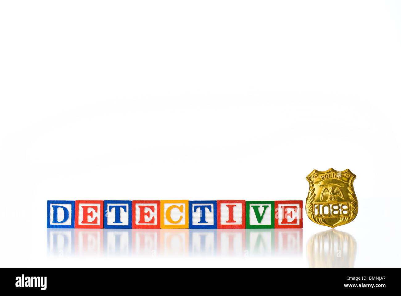 Colorful children's blocks spelling DETECTIVE with a police badge Stock ...