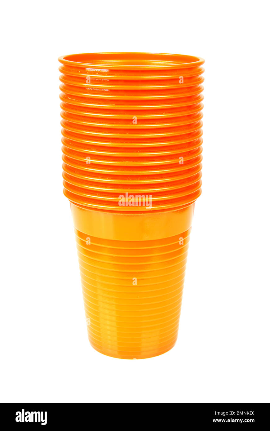 Stack of orange plastic cups isolated on white background Stock Photo ...