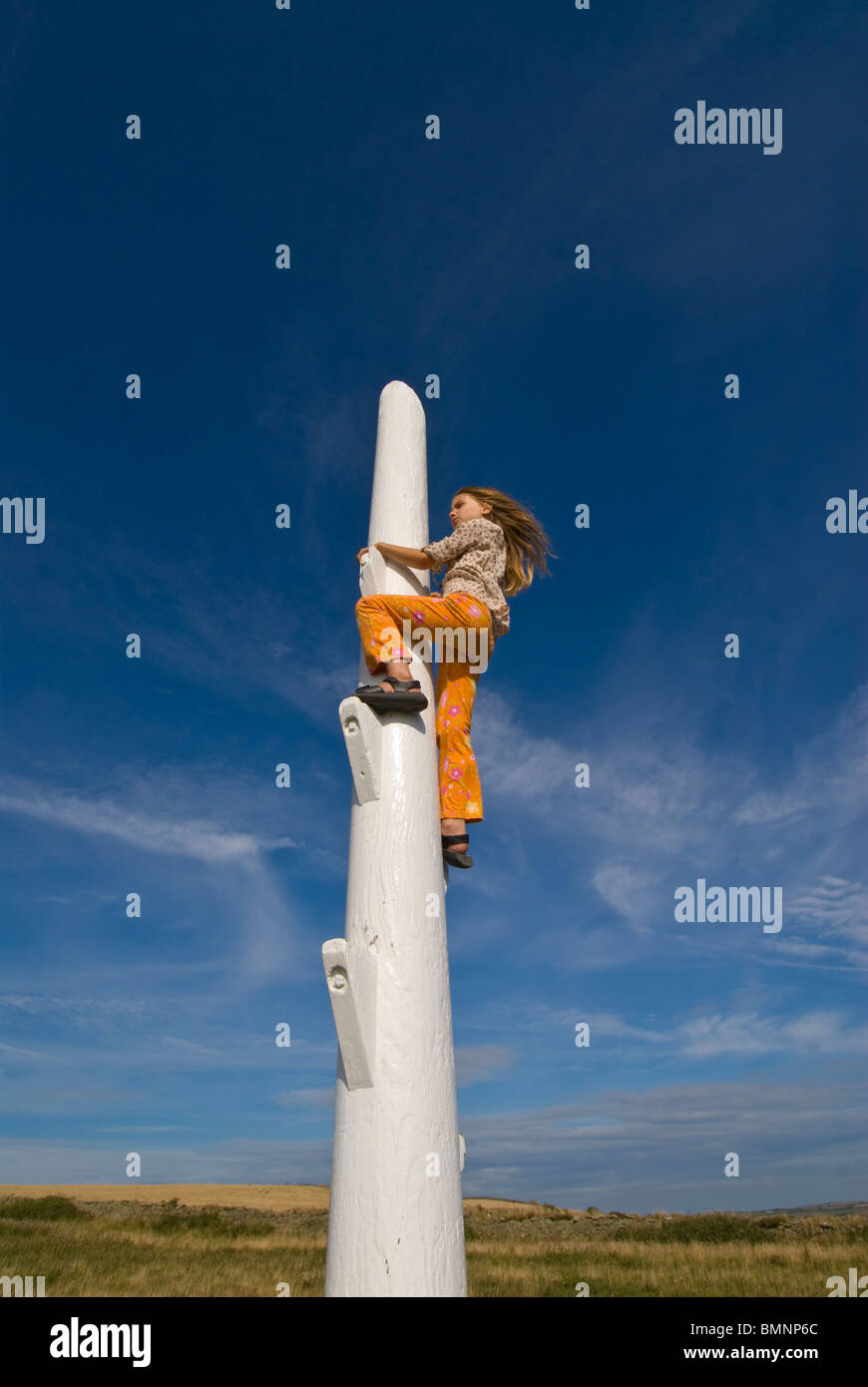 Children climbing on pole hi-res stock photography and images - Alamy