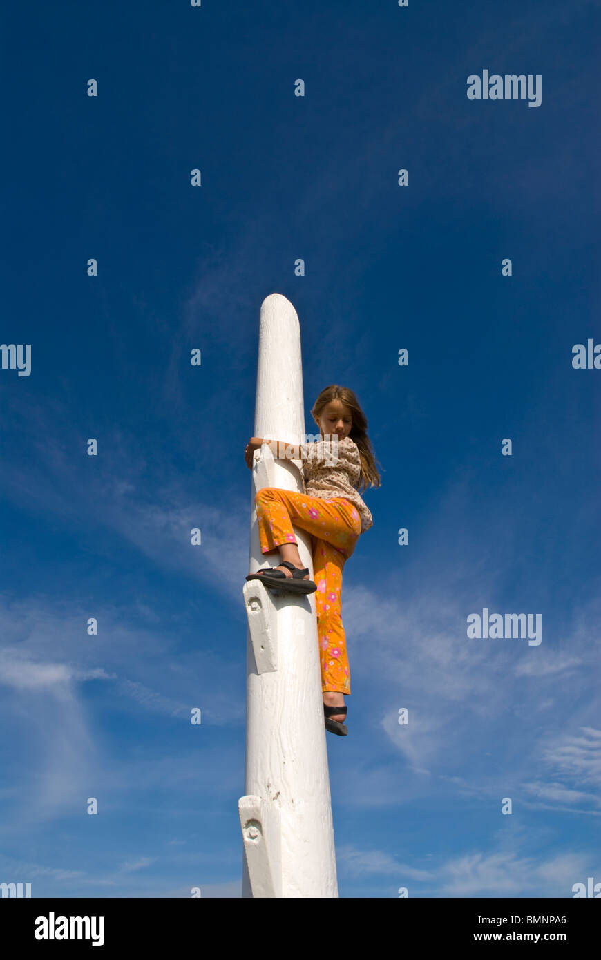North Devon Barnstaple Bay Child On Pole Stock Photo - Alamy