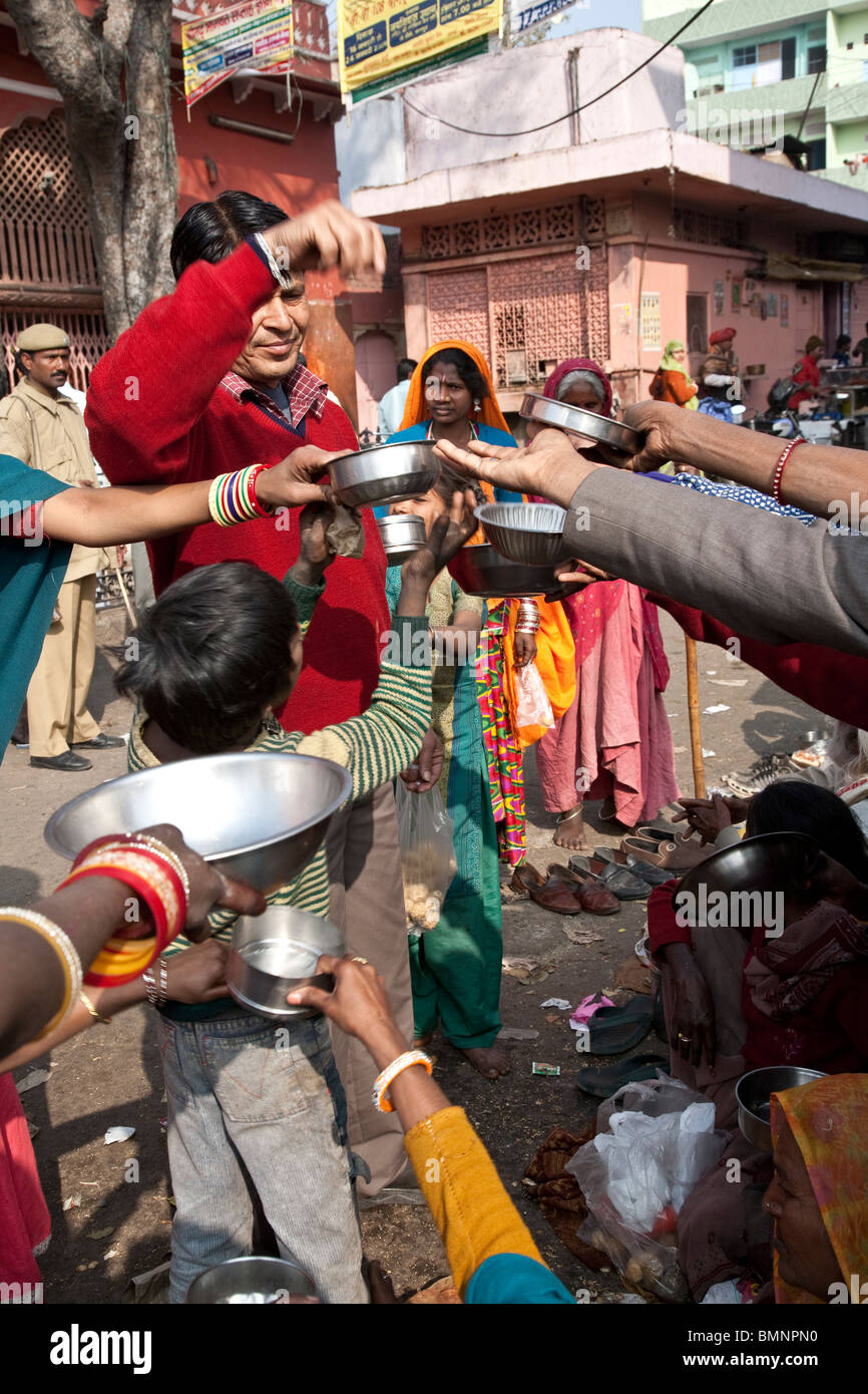Charity giving food hands hi-res stock photography and images - Alamy