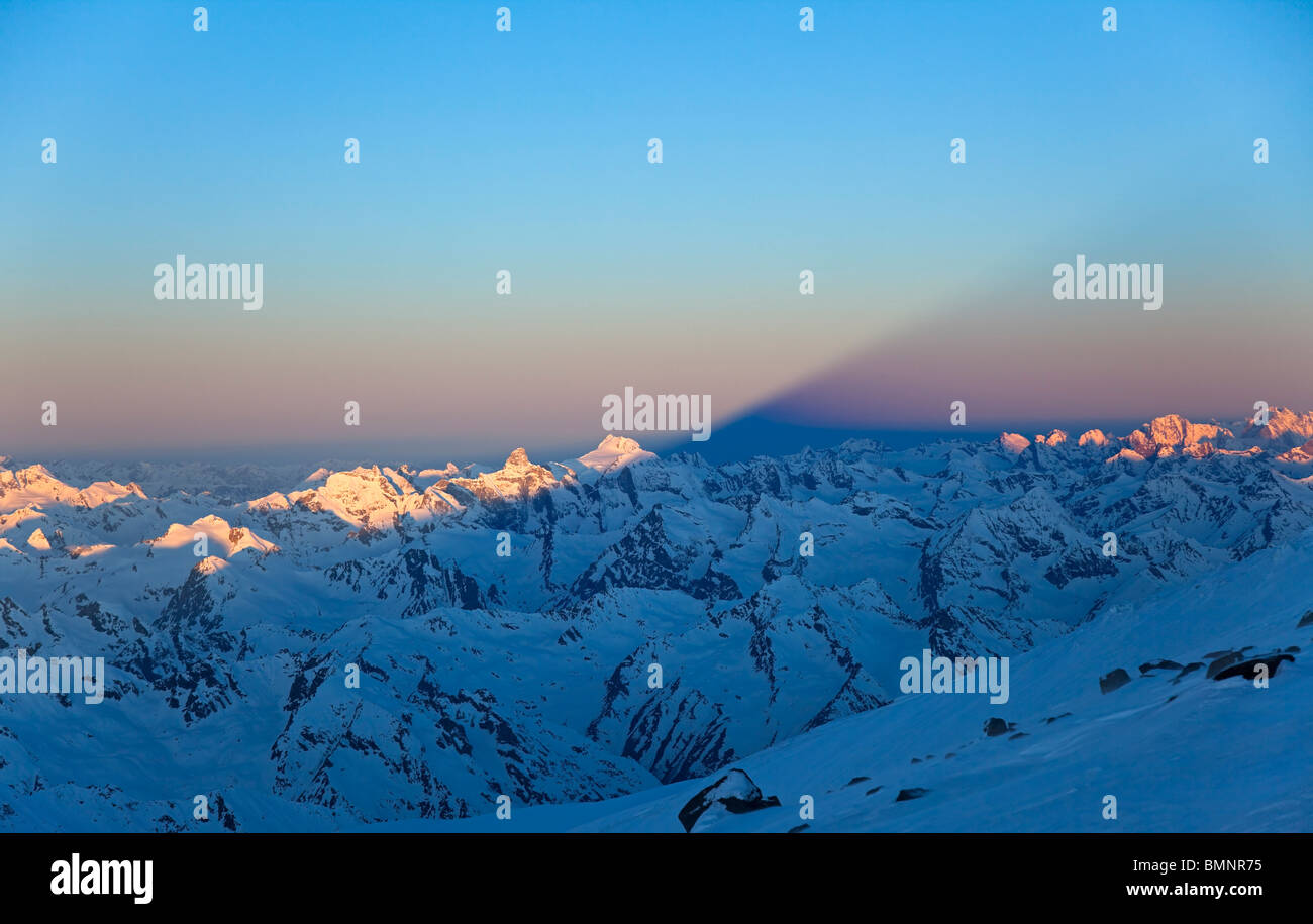 Mountain shadow on sunrise from Mt. Elbrus, Caucasus Mountain, Russia ...