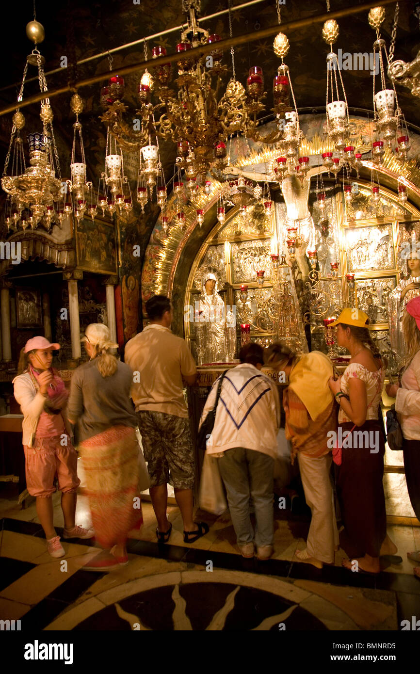 Golgotha altar at Holy Sepulchre, Jerusalem and pilgrims Stock Photo ...