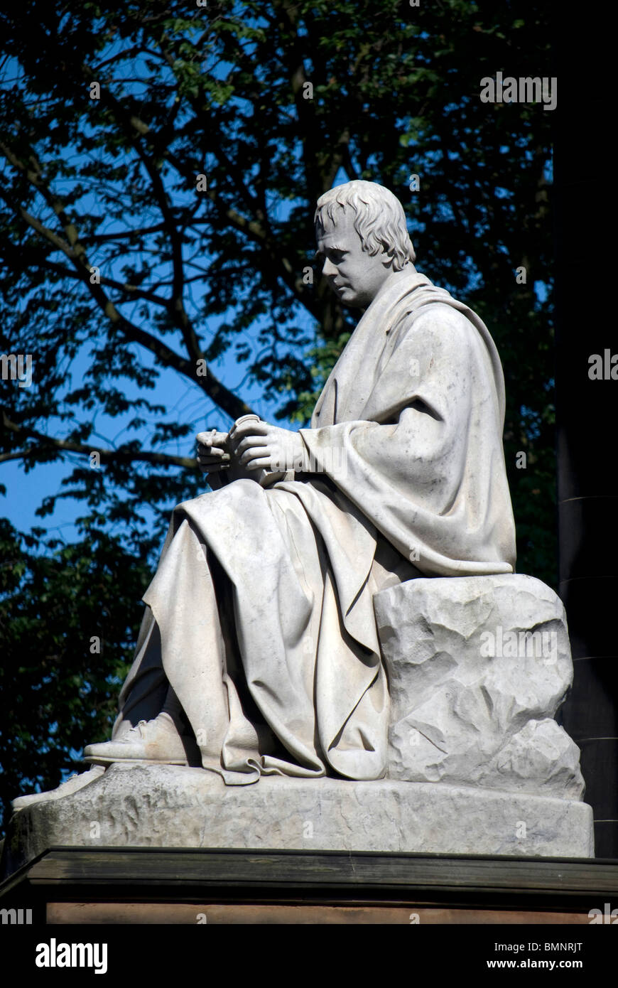 The statue of the author Sir Walter Scott under the Scott Monument in ...