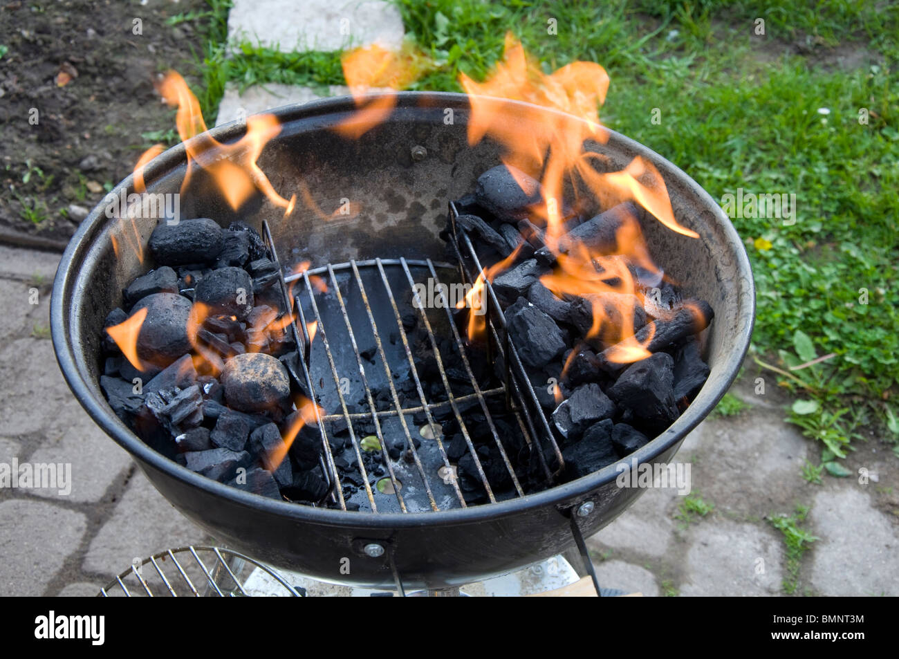 launching a barbeque with big hot flames Stock Photo - Alamy