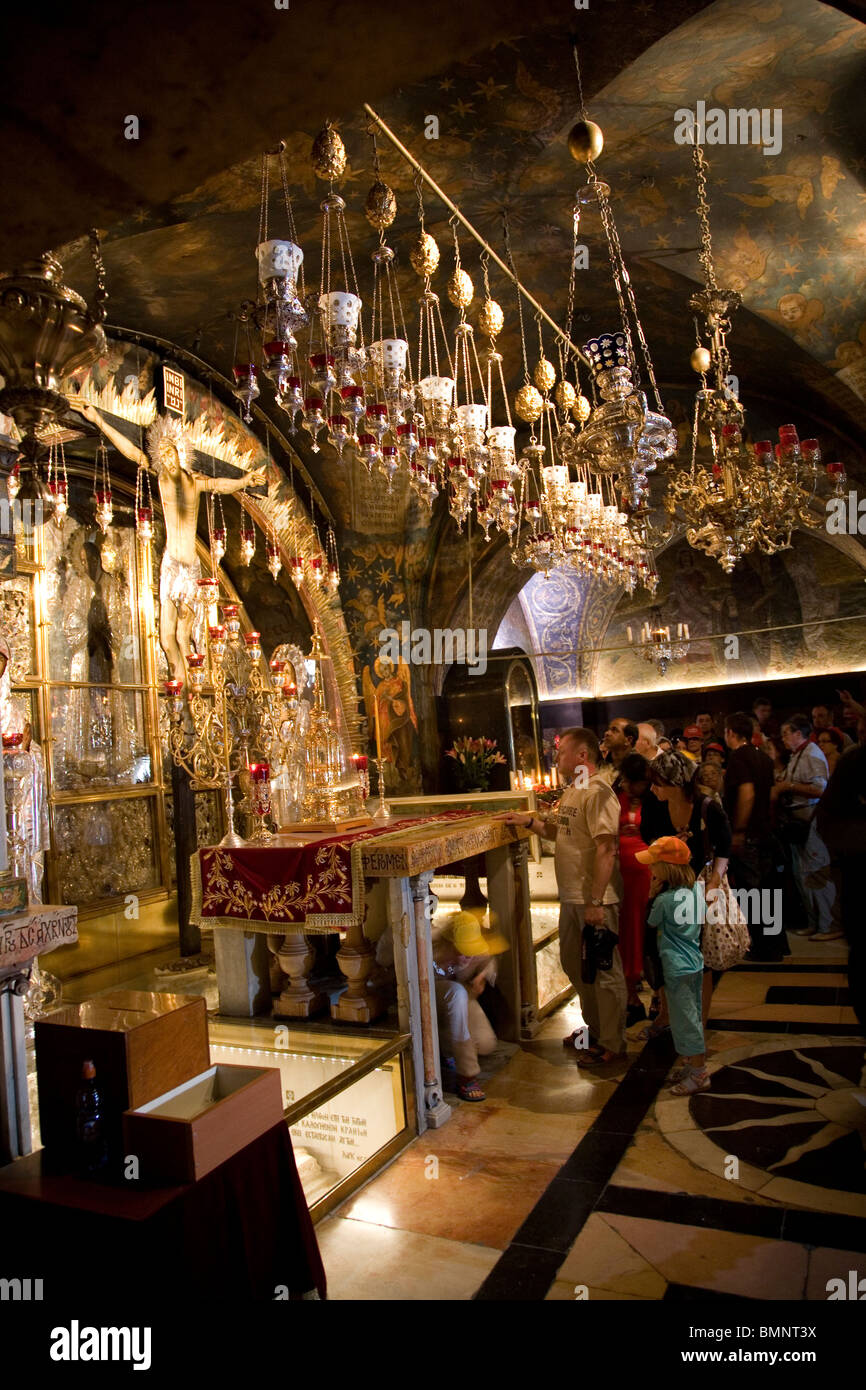 Golgotha altar at Holy Sepulchre, Jerusalem and pilgrims Stock Photo ...