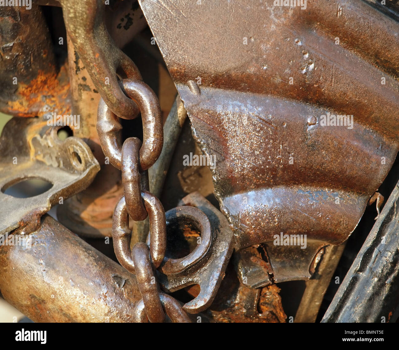 Rusted pieces of scrap metal thrown on a pile Stock Photo - Alamy