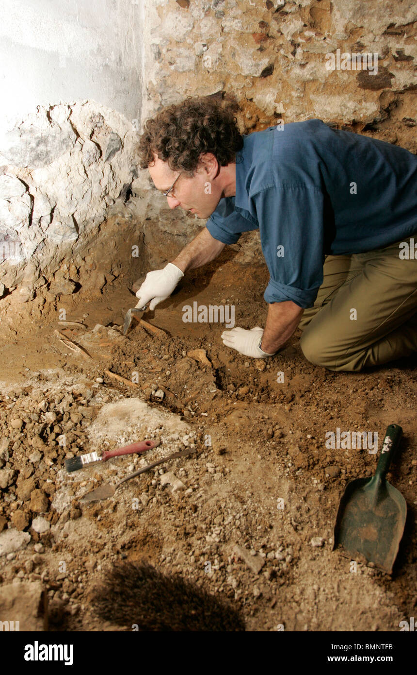 archaeologist from city of london museum uncover bones in st marys ...