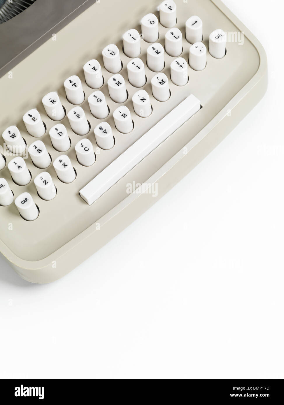 Closeup of a retro typewriter keyboard isolated on white background ...