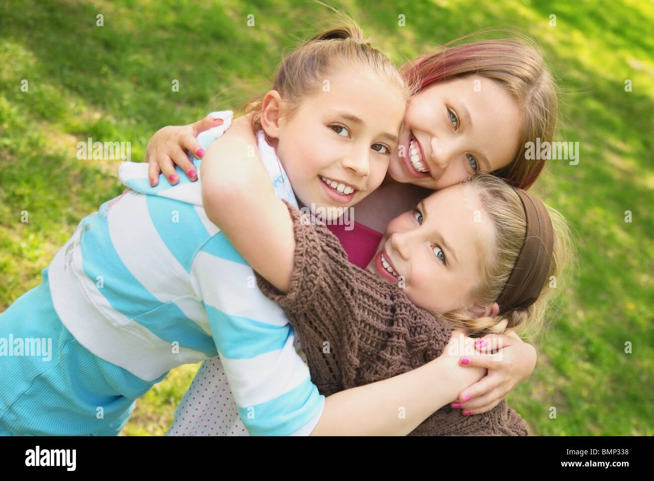 Friendship, embrace, behind hi-res stock photography and images - Alamy